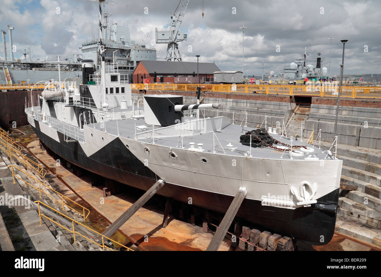 The HMS Monitor M33 in dry dock in Portsmouth Historic Dockyard ...