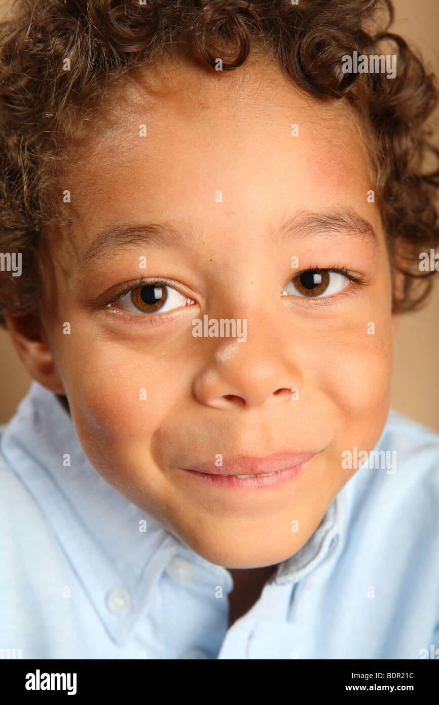 Young boy smiling Stock Photo - Alamy