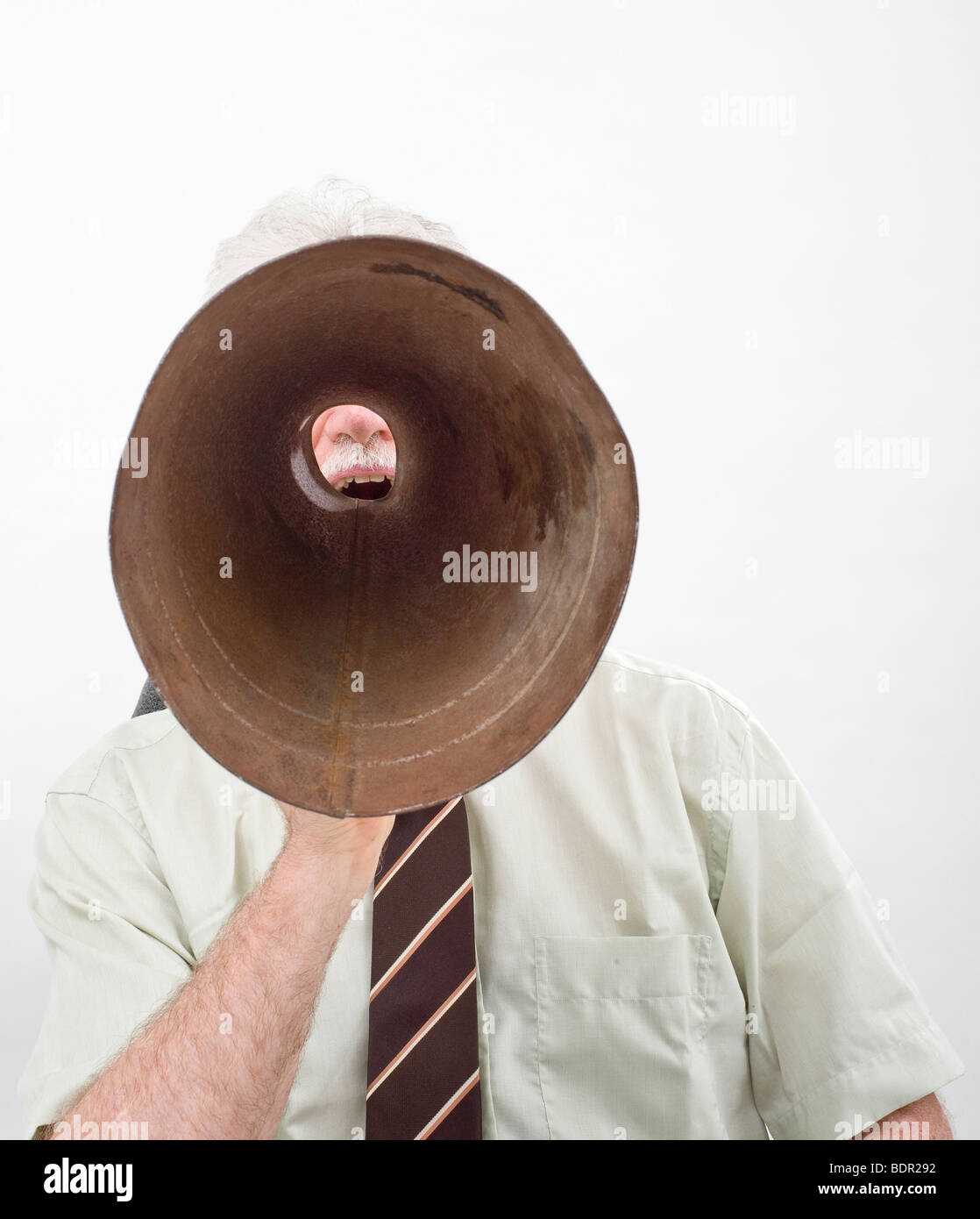 senior businessman using a retro megaphone Stock Photo - Alamy