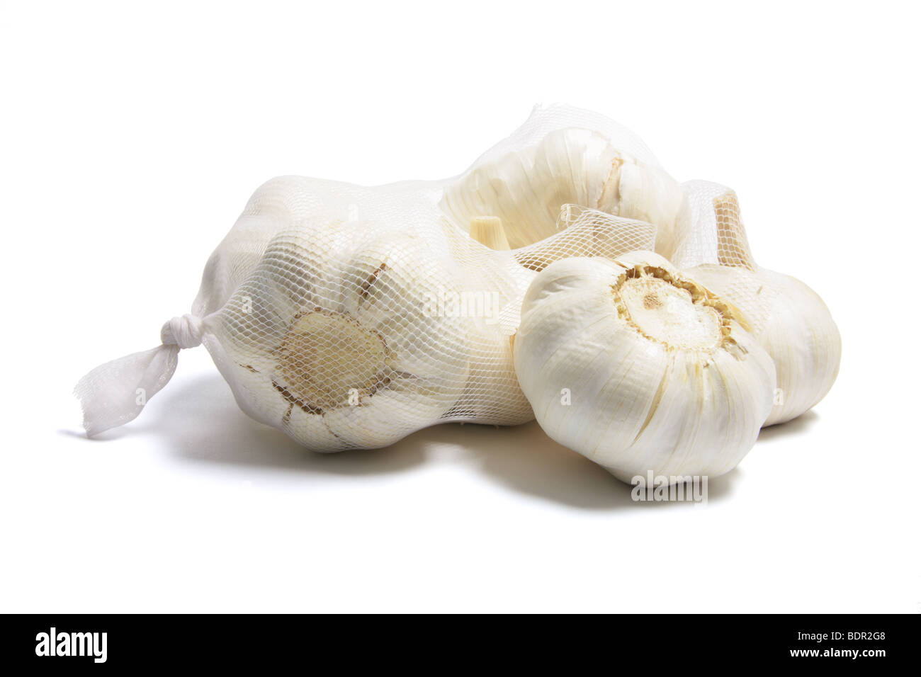 Garlic in Mesh Bag Stock Photo - Alamy