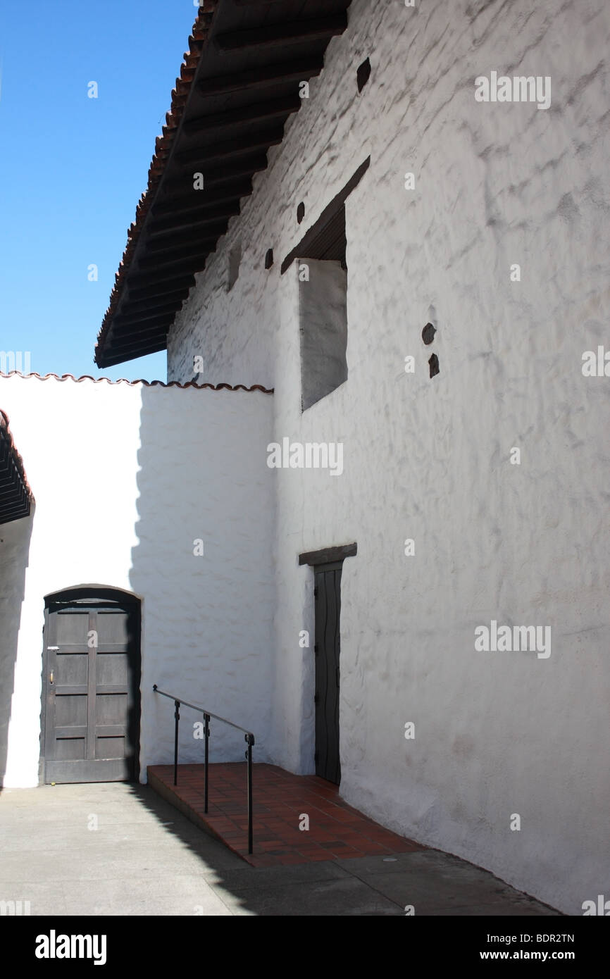 Old Spanish adobe colonial building wall and backyard Stock Photo - Alamy