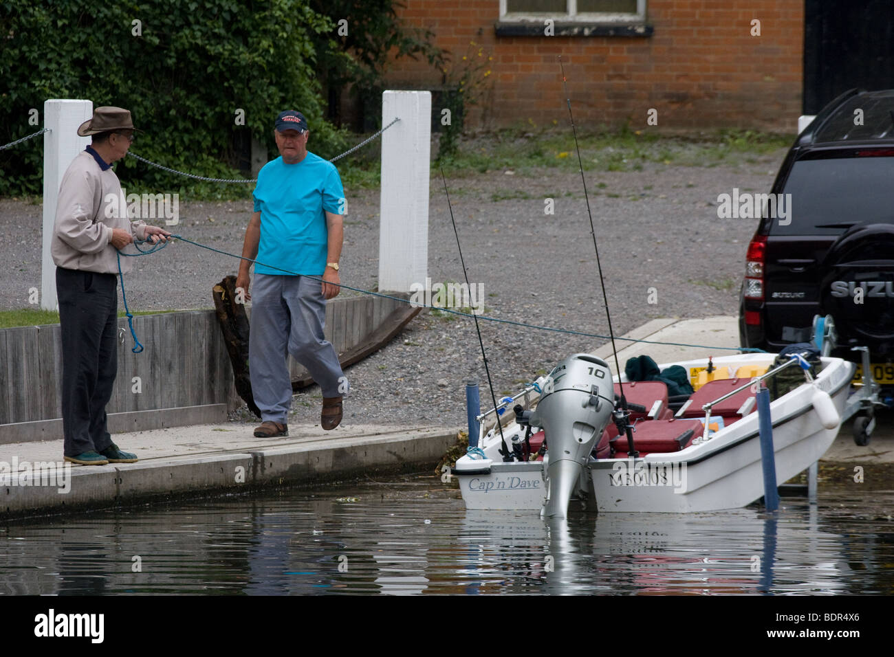 Slipway outboard dinghy launching boat hi-res stock photography and ...