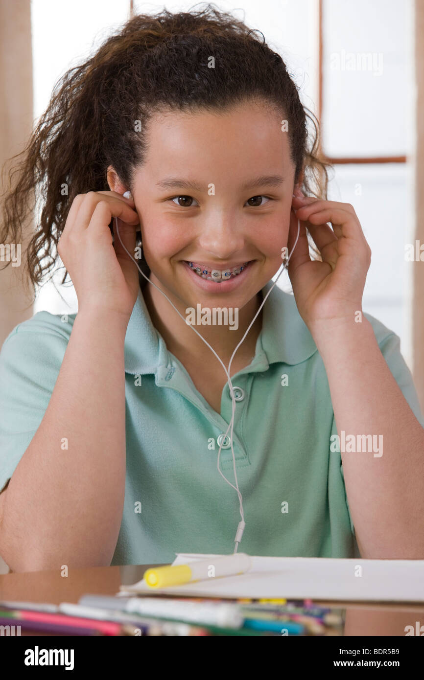 Girl listening to music Stock Photo - Alamy