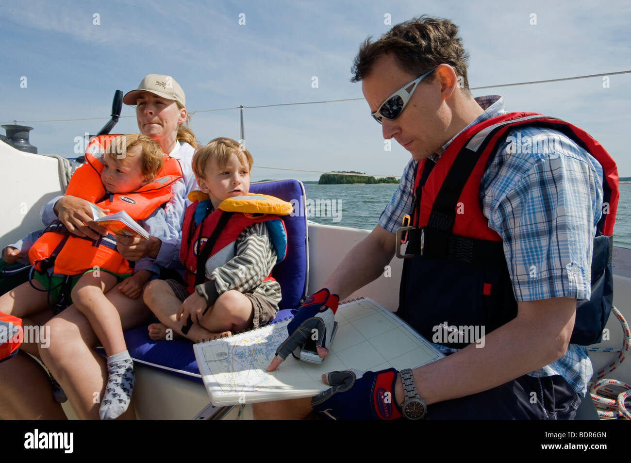 Family time on boats hi-res stock photography and images - Alamy
