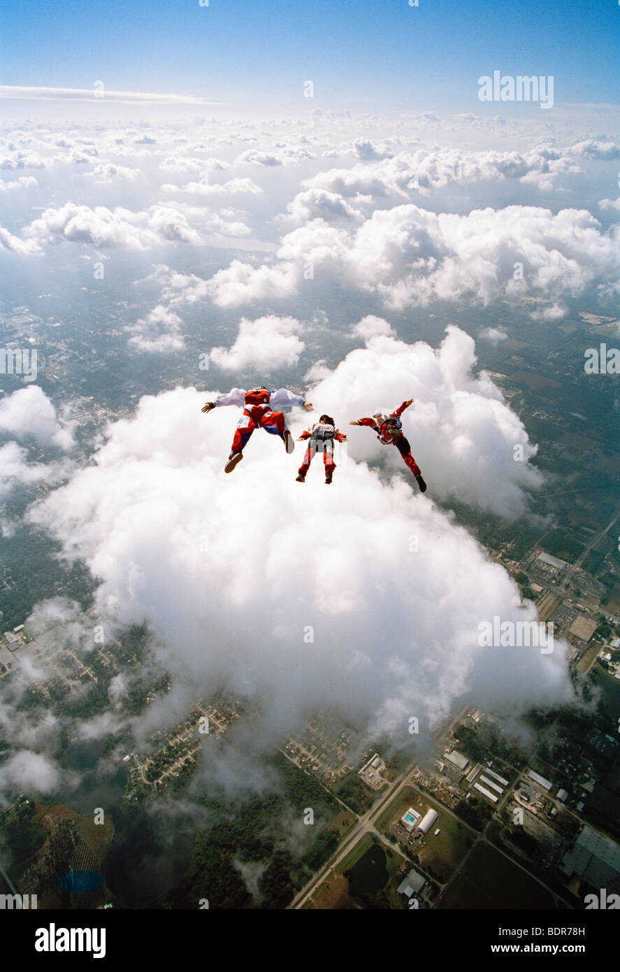 Three parachute jumpers USA Stock Photo - Alamy