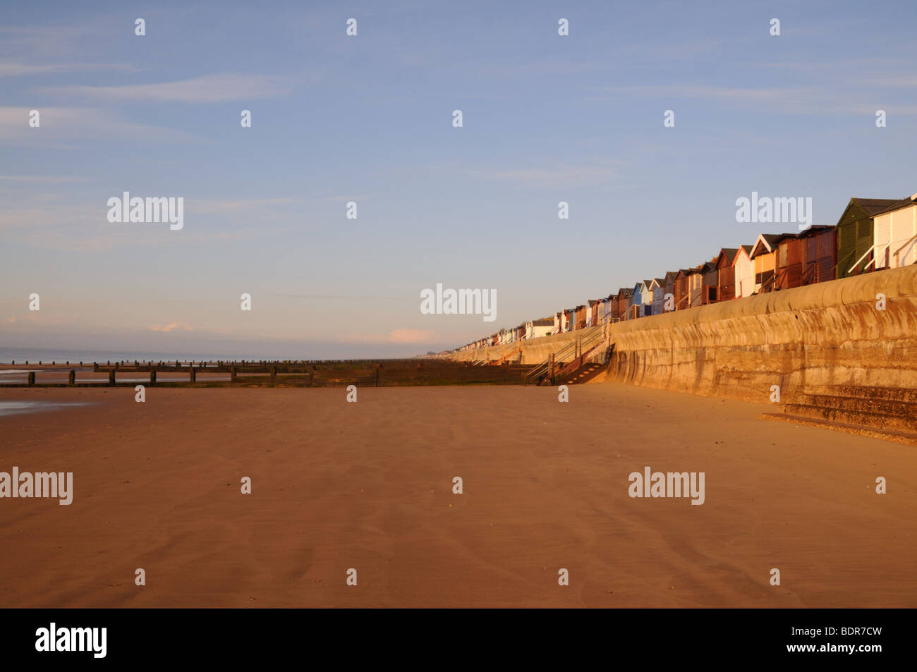 Frinton Beach Essex at sunrise with beach huts and promenade Stock ...