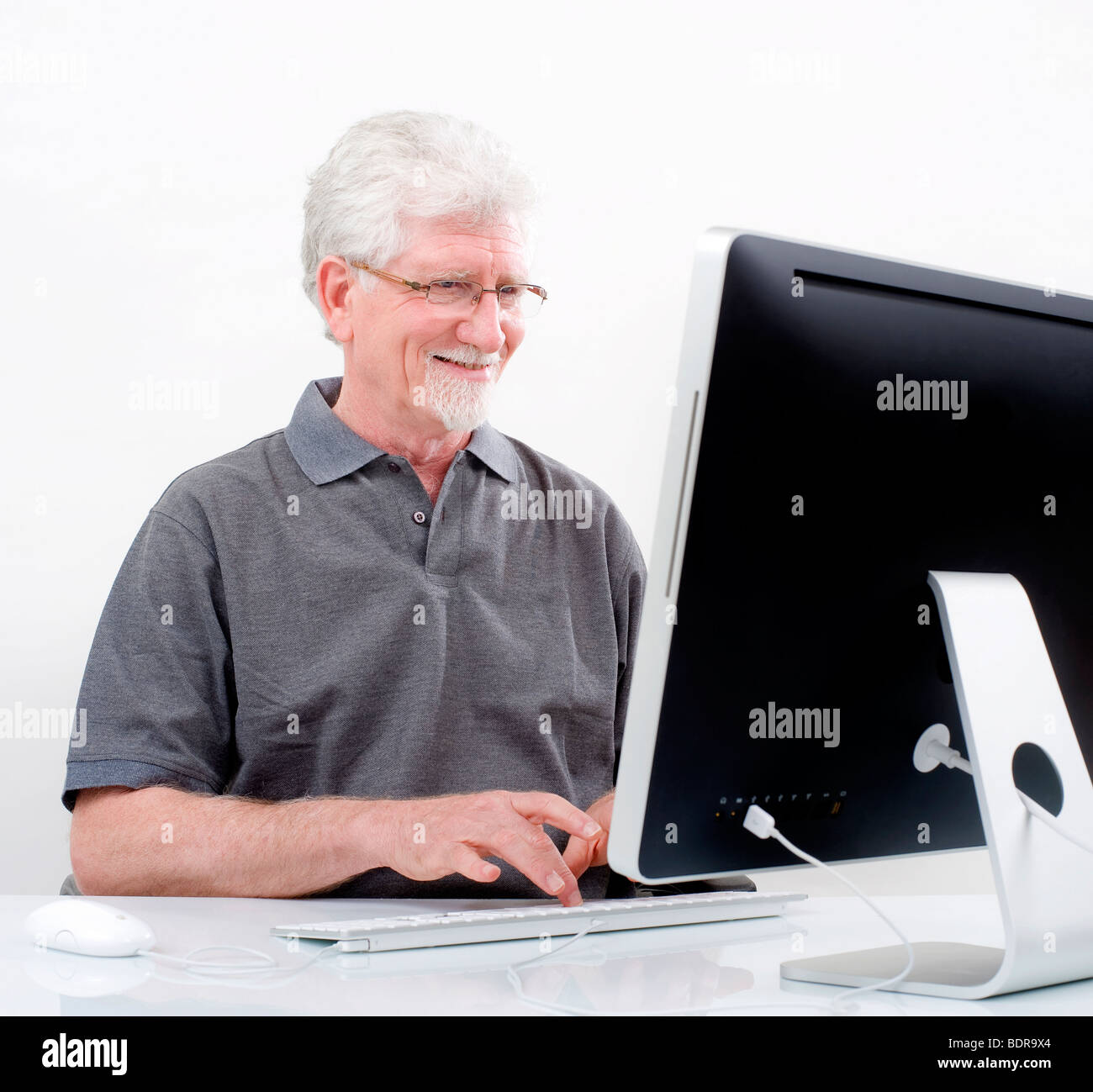 senior man with computer at home Stock Photo - Alamy