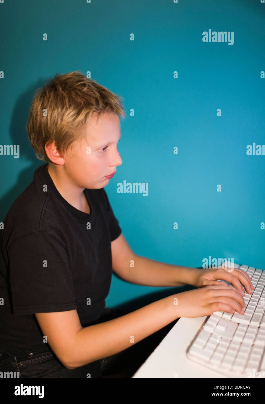 A boy in front of his computer Sweden Stock Photo - Alamy