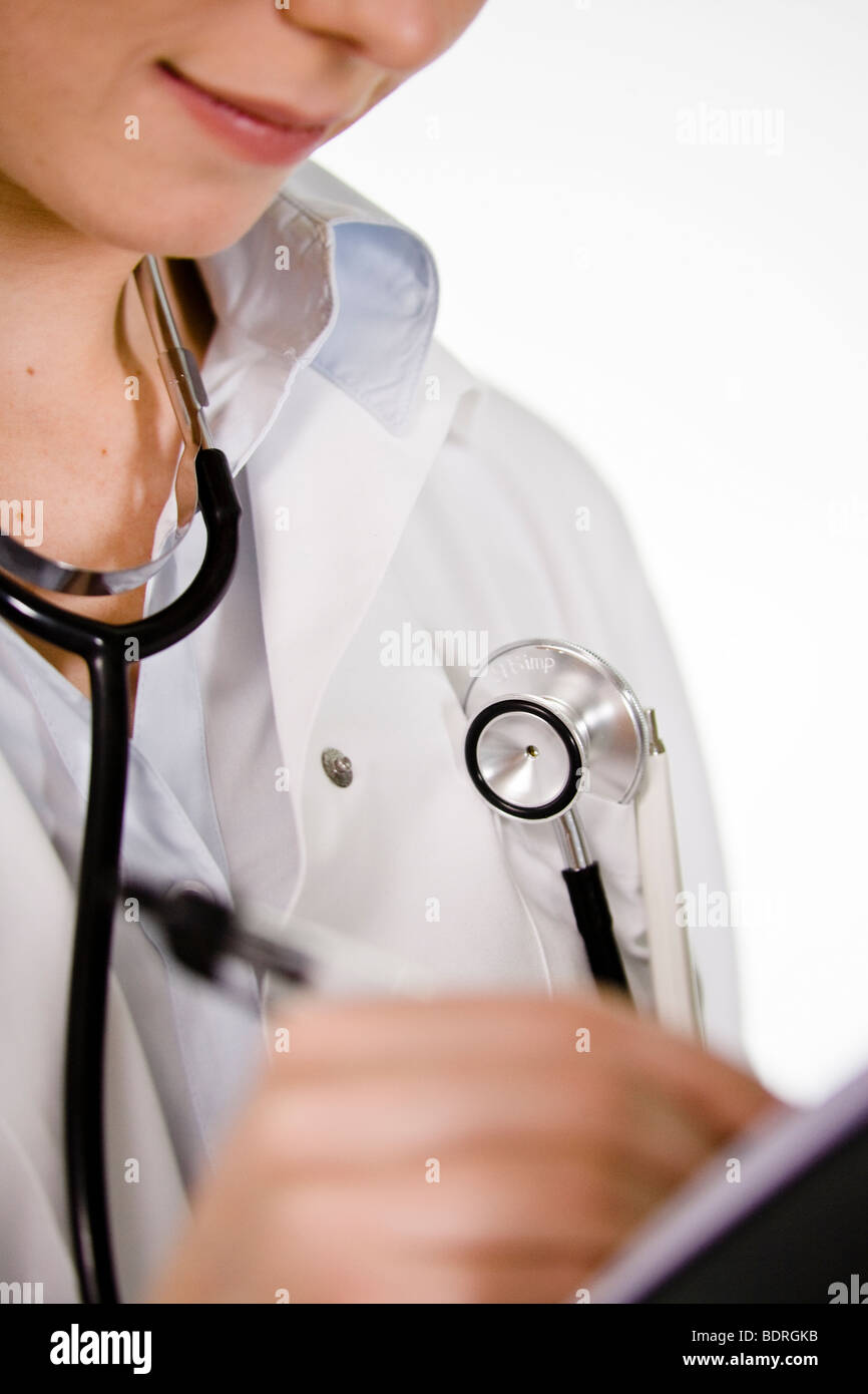 A doctor taking notes Stock Photo - Alamy
