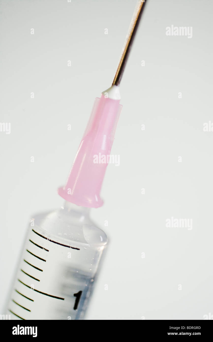 An injection needle close-up Stock Photo - Alamy