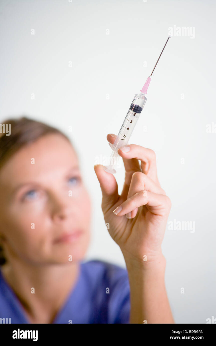Nurse preparing injection close-up Stock Photo - Alamy