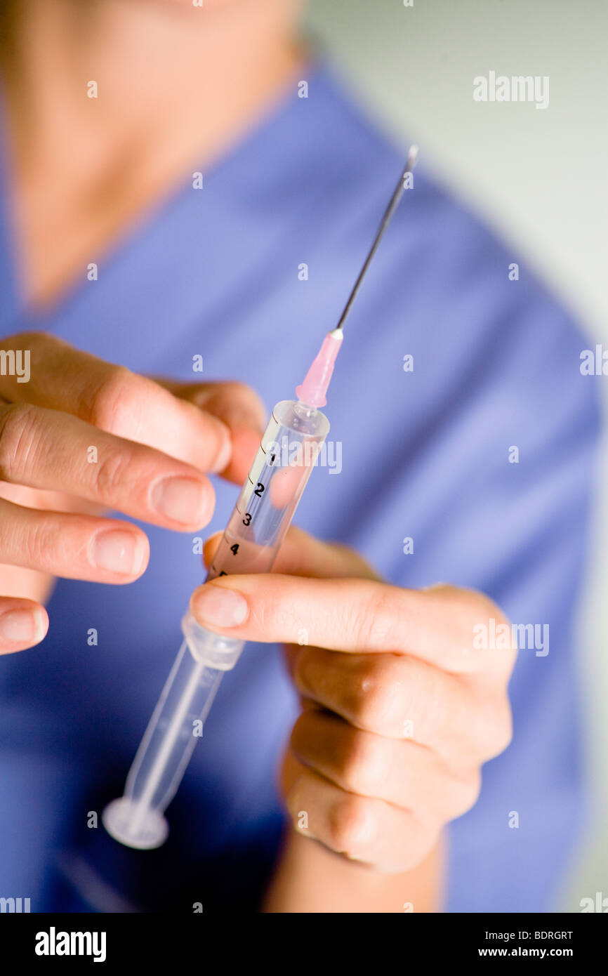 Nurse preparing injection close-up Stock Photo - Alamy
