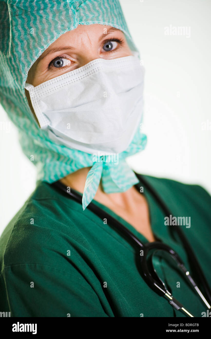 A doctor wearing a green uniform Stock Photo - Alamy