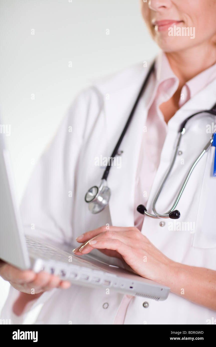 Medical doctor using laptop hi-res stock photography and images - Alamy