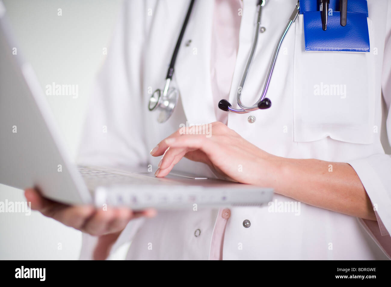 A doctor using a laptop Stock Photo - Alamy