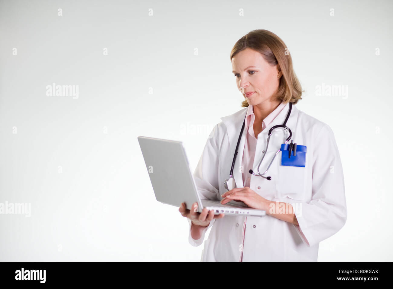 A doctor using a laptop Stock Photo - Alamy