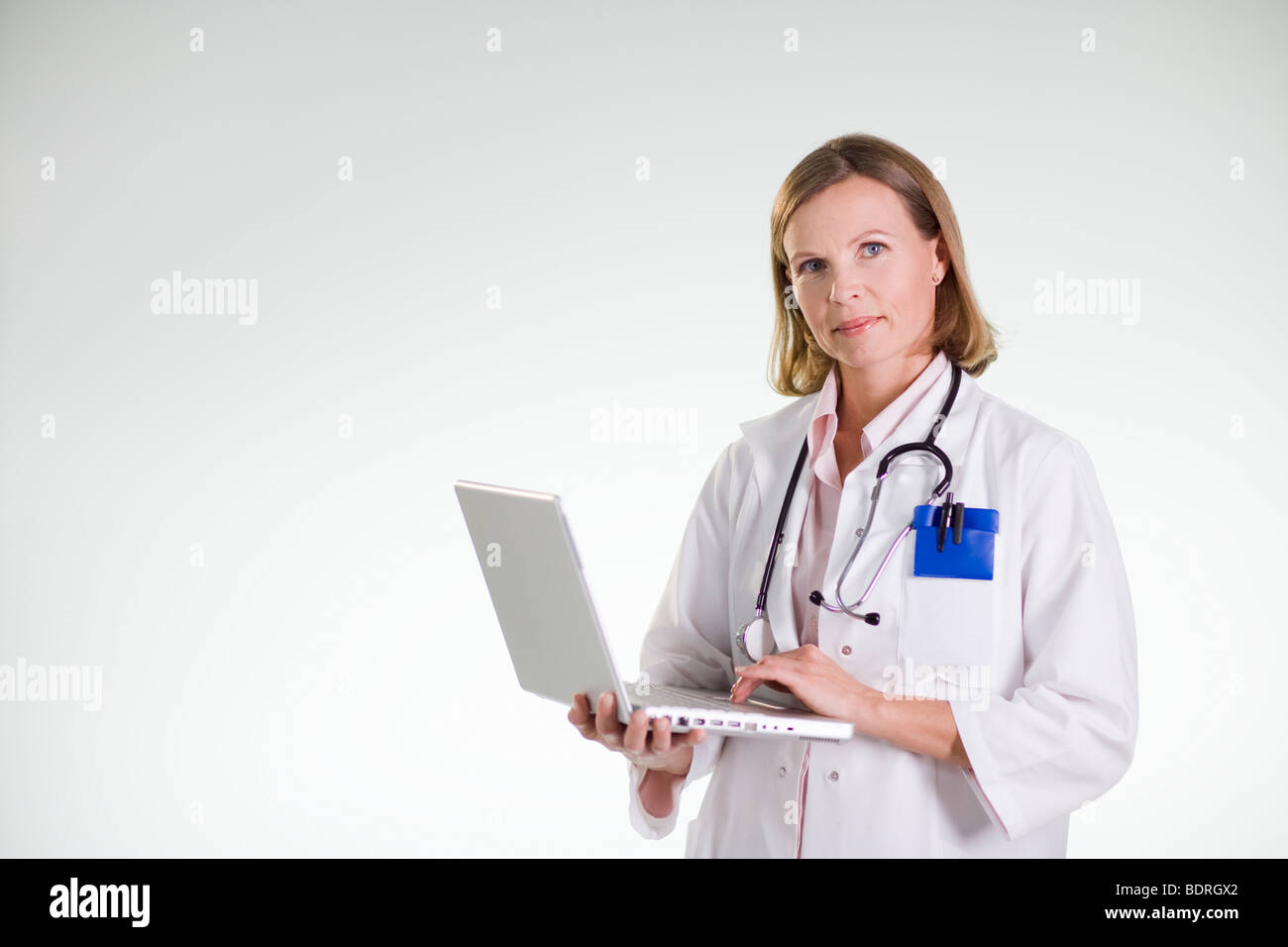 A doctor using a laptop Stock Photo - Alamy