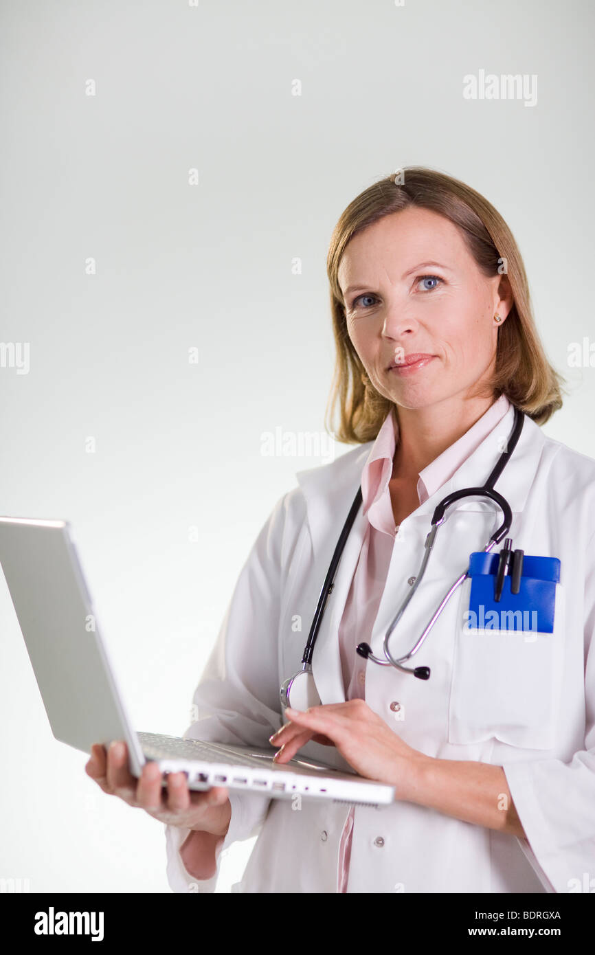 A doctor using a laptop Stock Photo - Alamy
