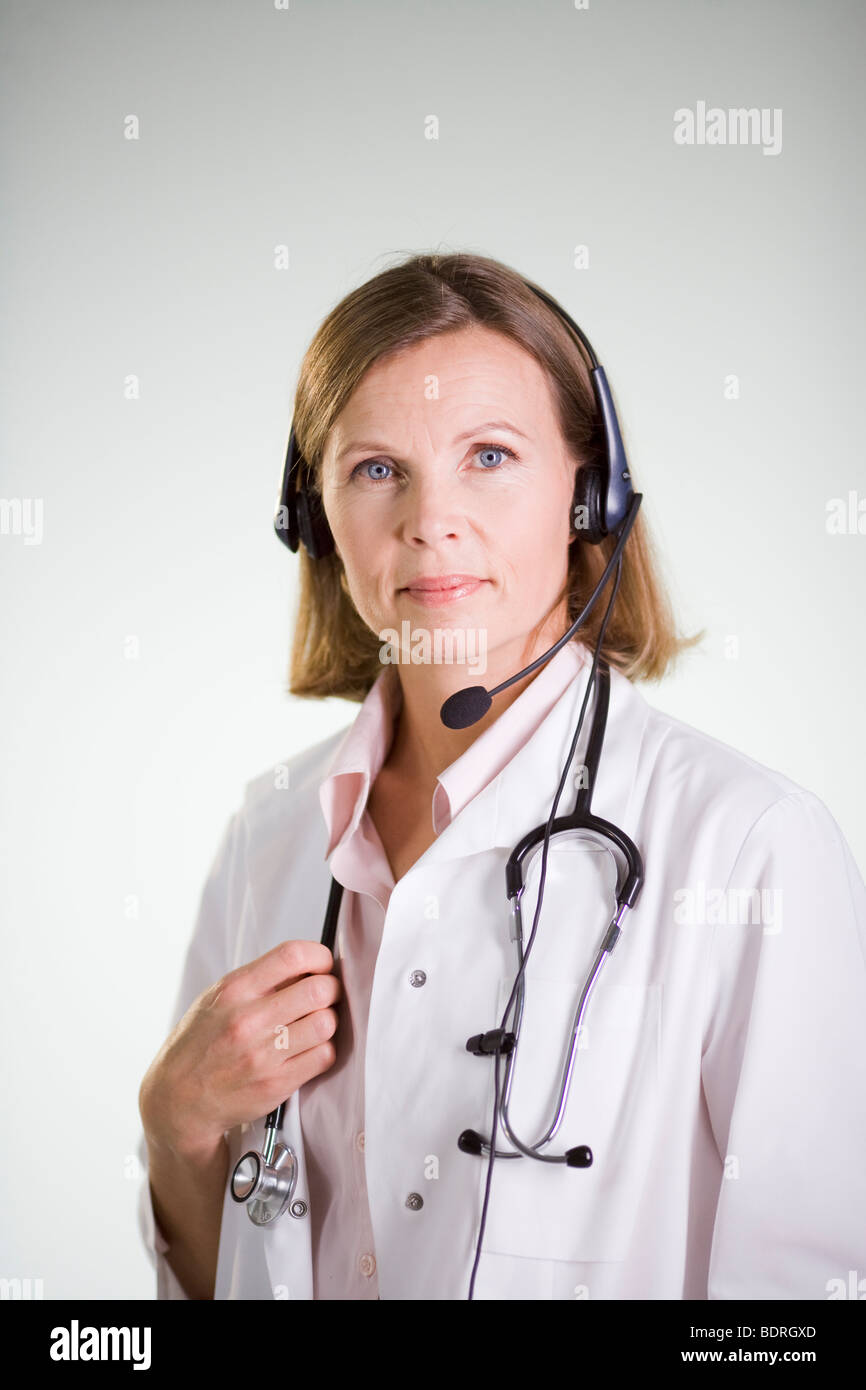 A docotor giving advice over the phone Stock Photo - Alamy