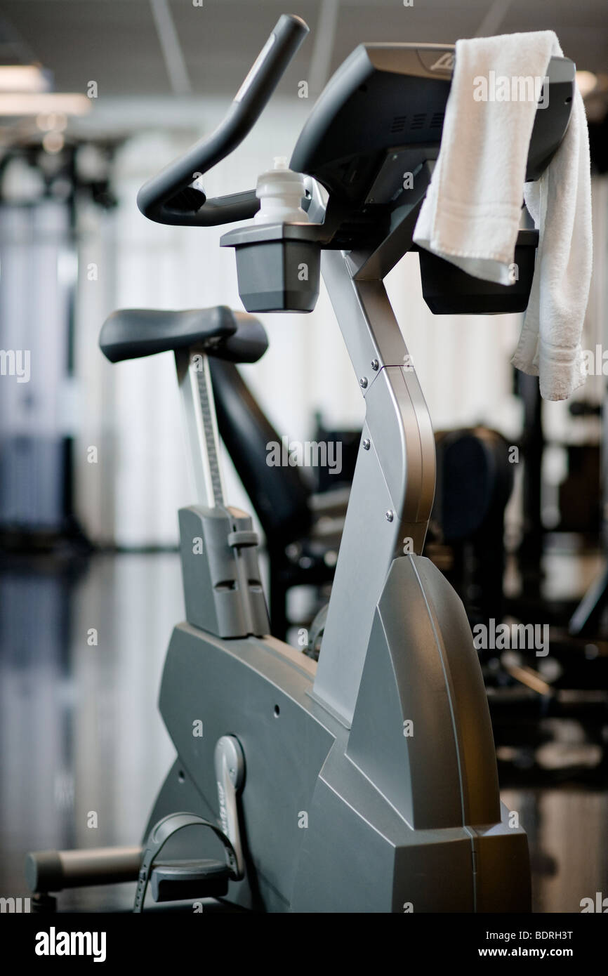 An exercise bike at a gym Stock Photo - Alamy