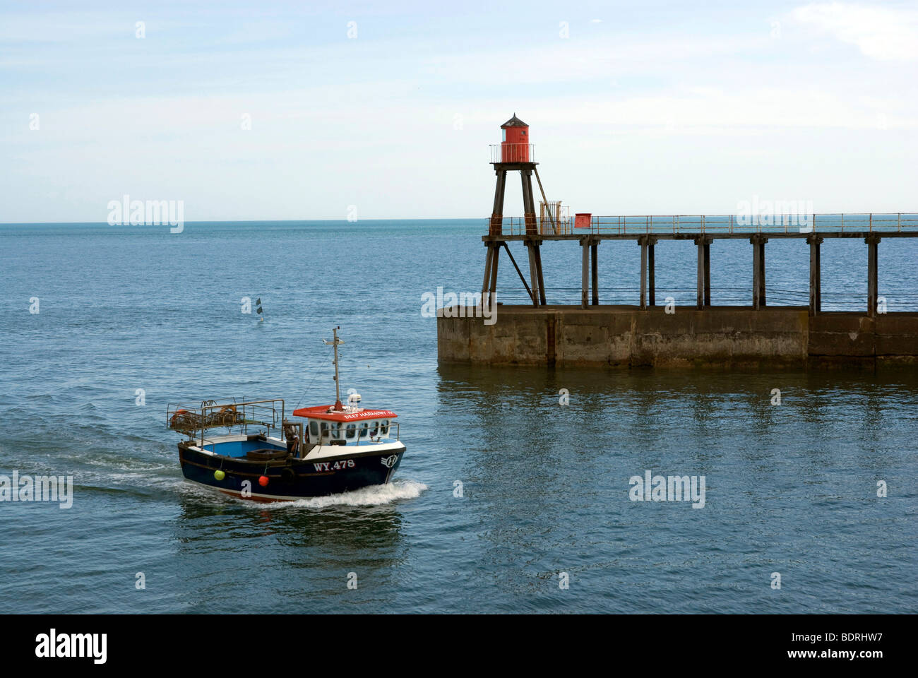 A small fishing boat returning to Whitby harbour Stock Photo - Alamy A small fishing boat returning to Whitby harbour Stock Photo - Alamy