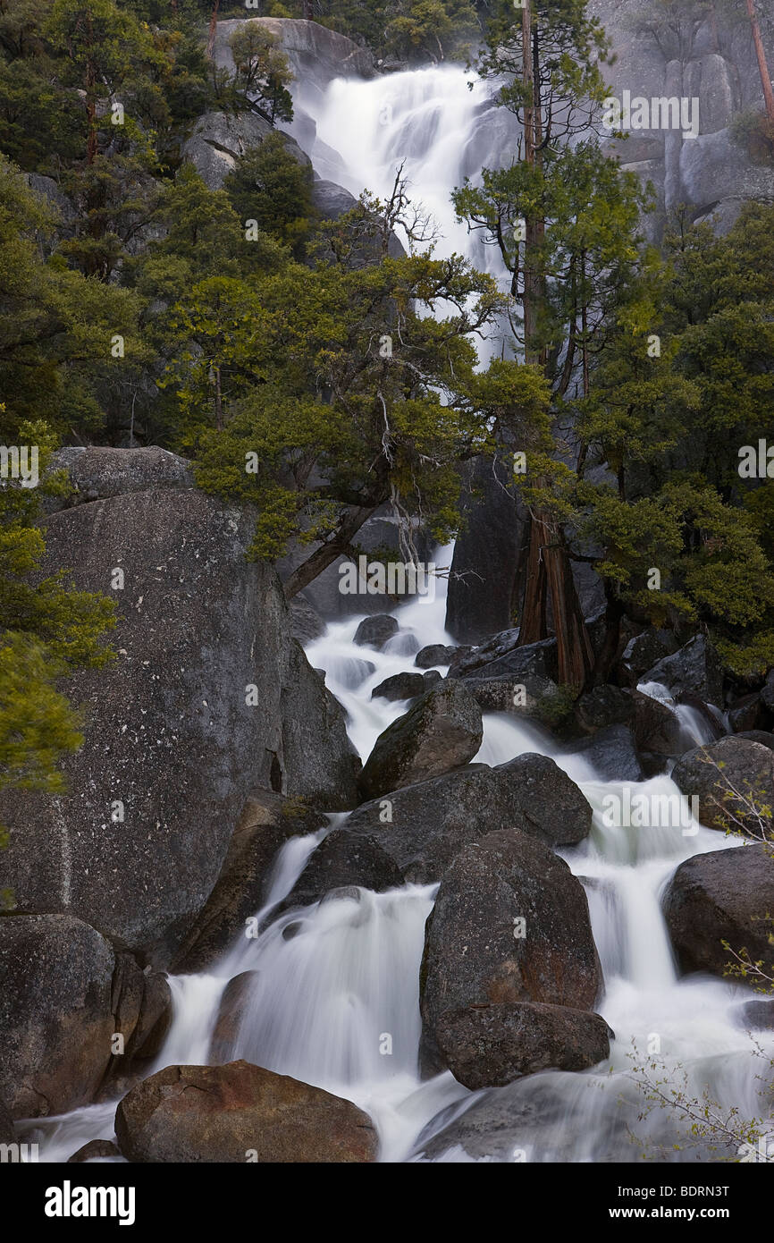 A seasonal waterfall, Cascade Fall, flows under Highway 120 on the ...