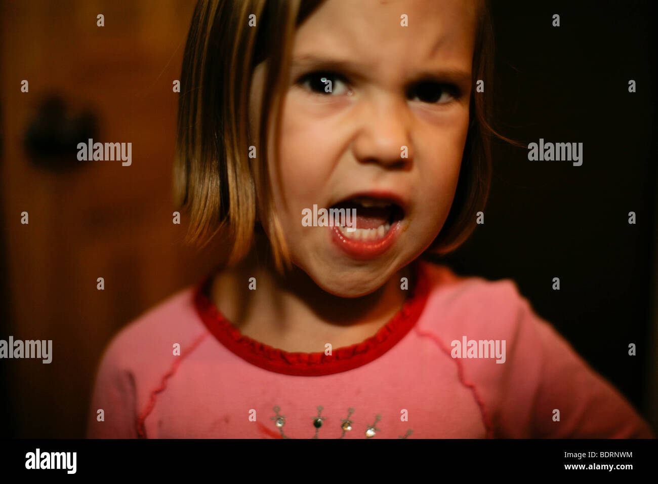 Portrait of girl screaming Stock Photo - Alamy