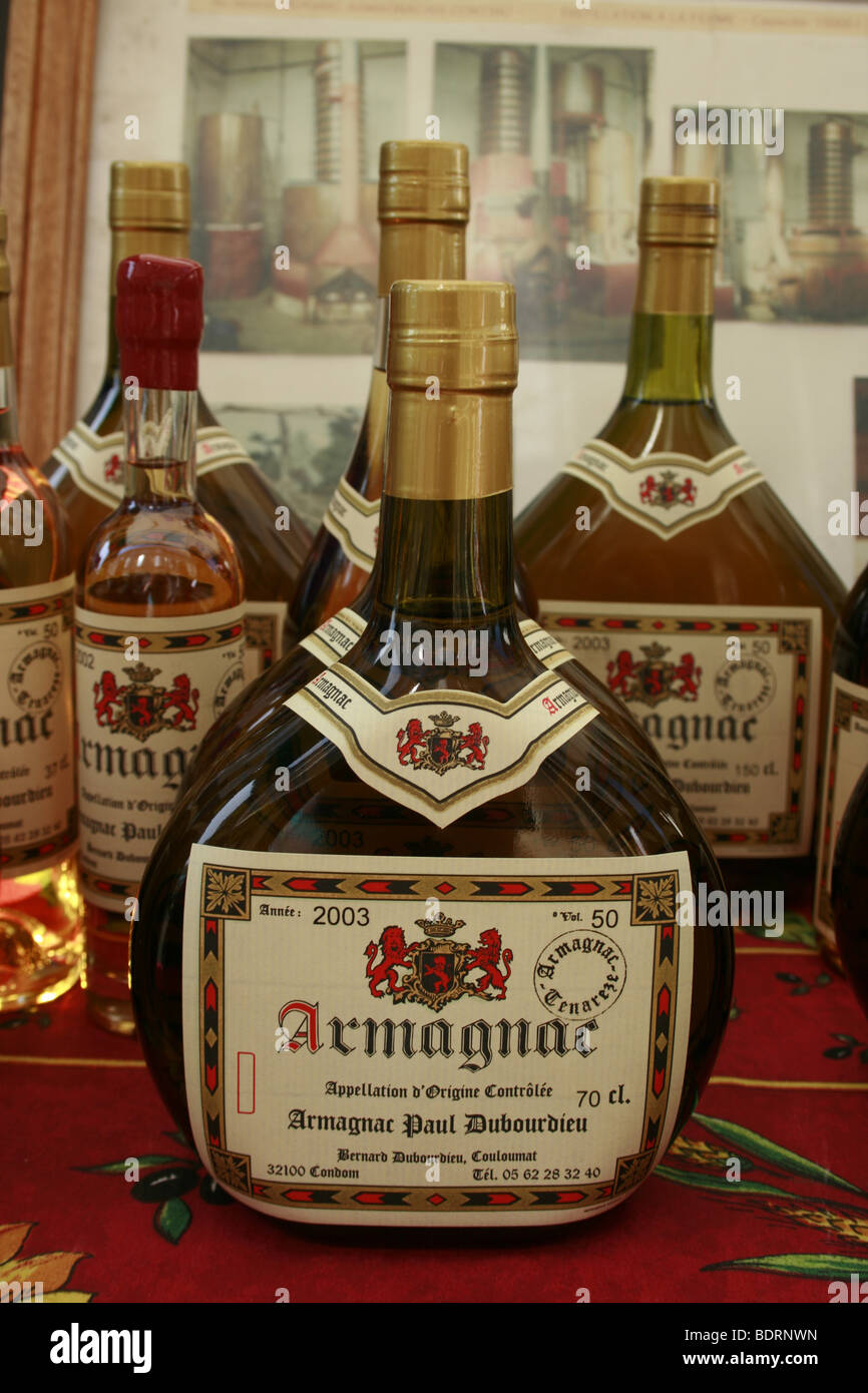 Bottles of Armagnac sold at the weekly market in Lectoure, France Stock ...