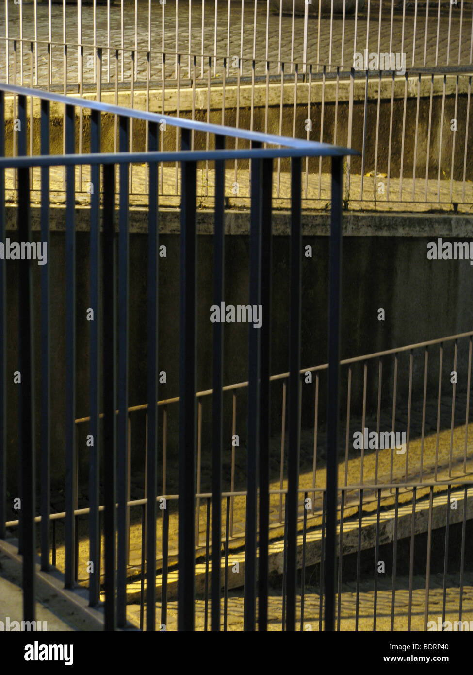 empty dark footpath ramp in city town at night Stock Photo - Alamy
