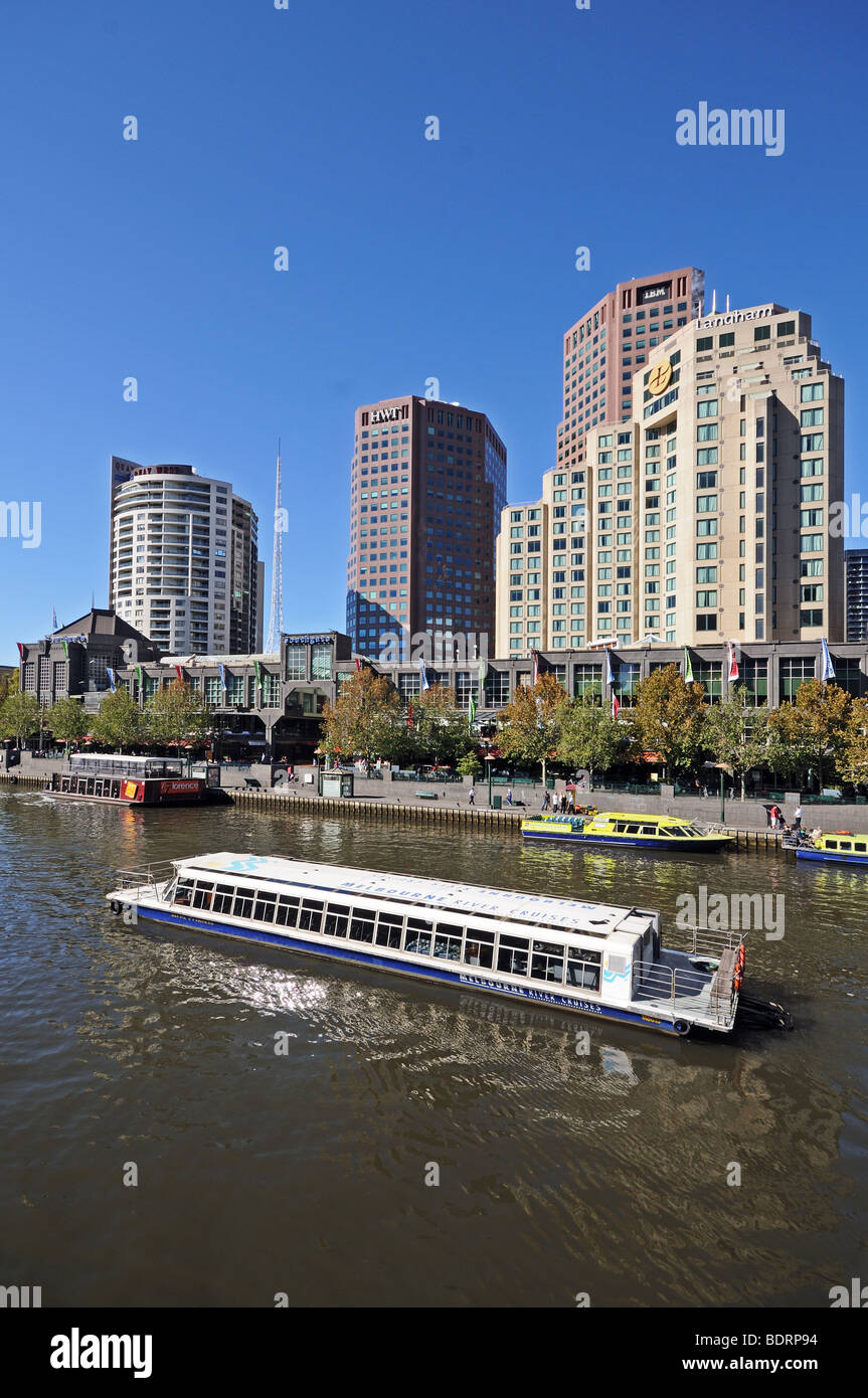 Melbourne River cruises and high rise buildings on banks of Yarra River ...
