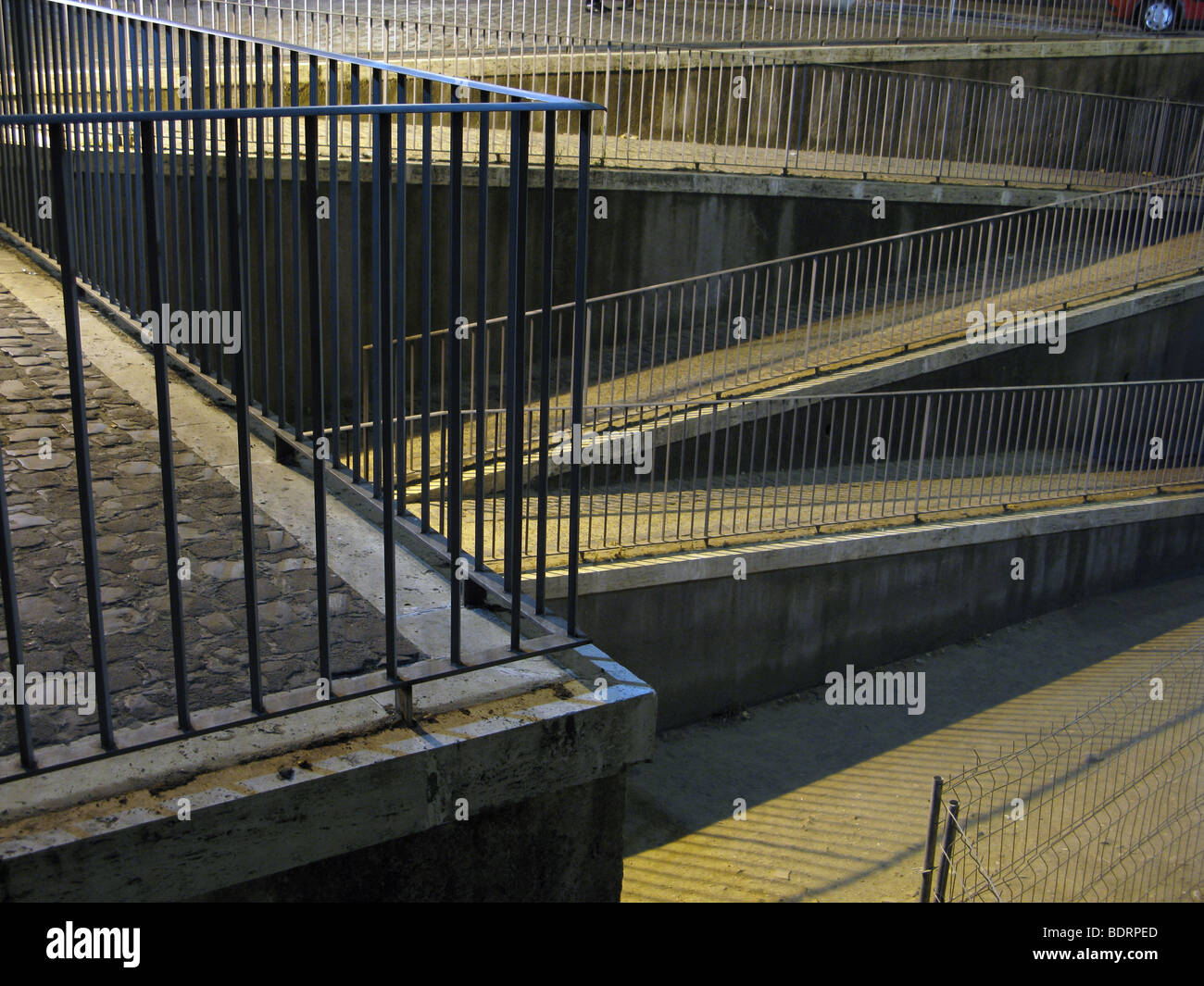 empty dark footpath ramp in city town at night Stock Photo - Alamy