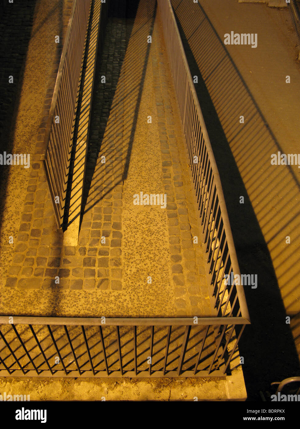 empty dark footpath ramp in city town at night Stock Photo - Alamy