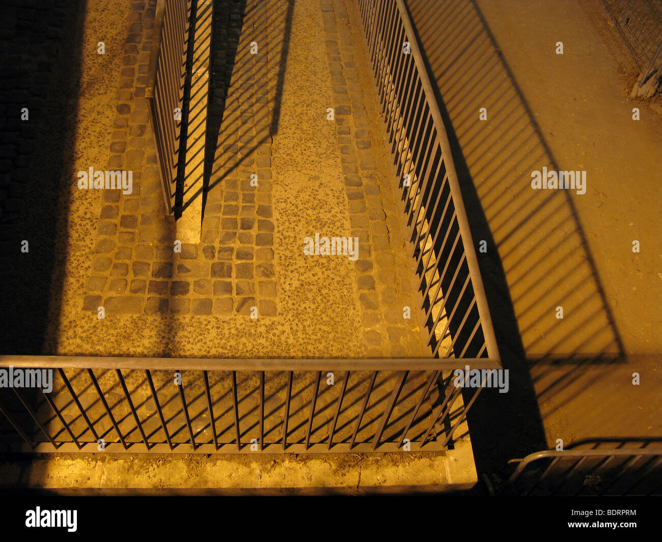 empty dark footpath ramp in city town at night Stock Photo - Alamy