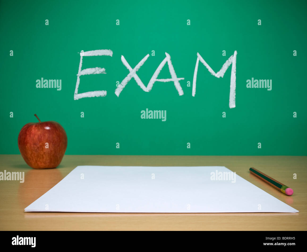 A few blank paper sheets ready for been filled in a exam Stock Photo ...