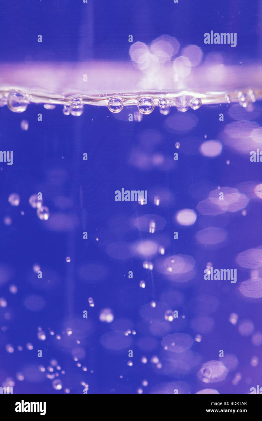 CO2 bubbles in carbonated water Stock Photo - Alamy