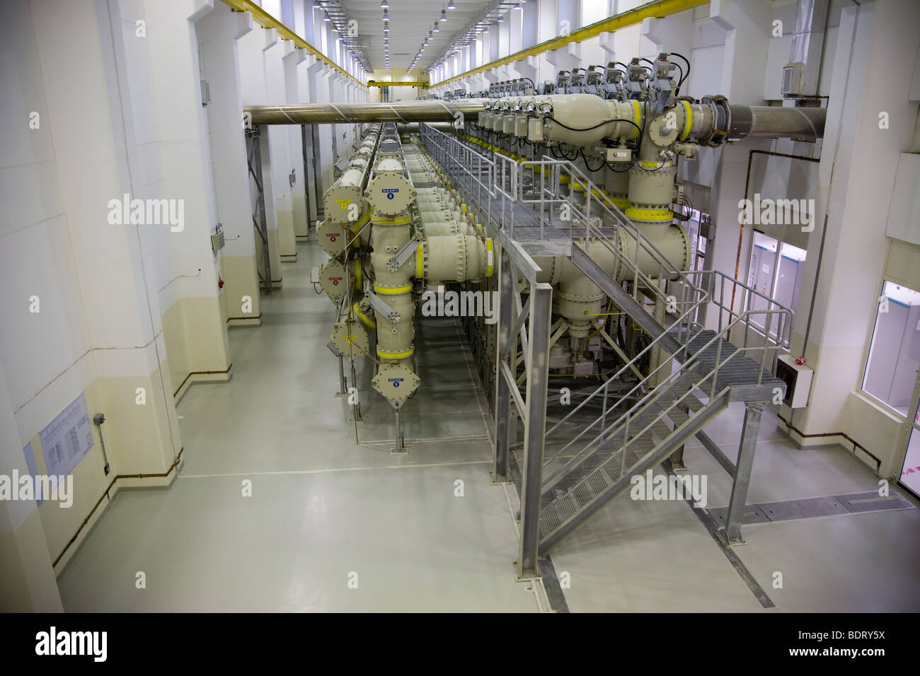 Electricity power plant turbine turbines machine room Stock Photo - Alamy