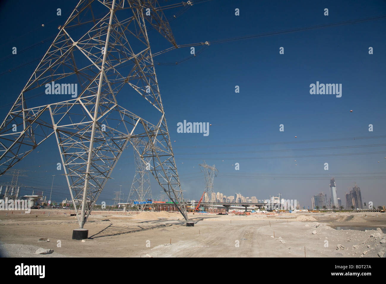 Jebel Ali Power station transmission lines uae Stock Photo - Alamy