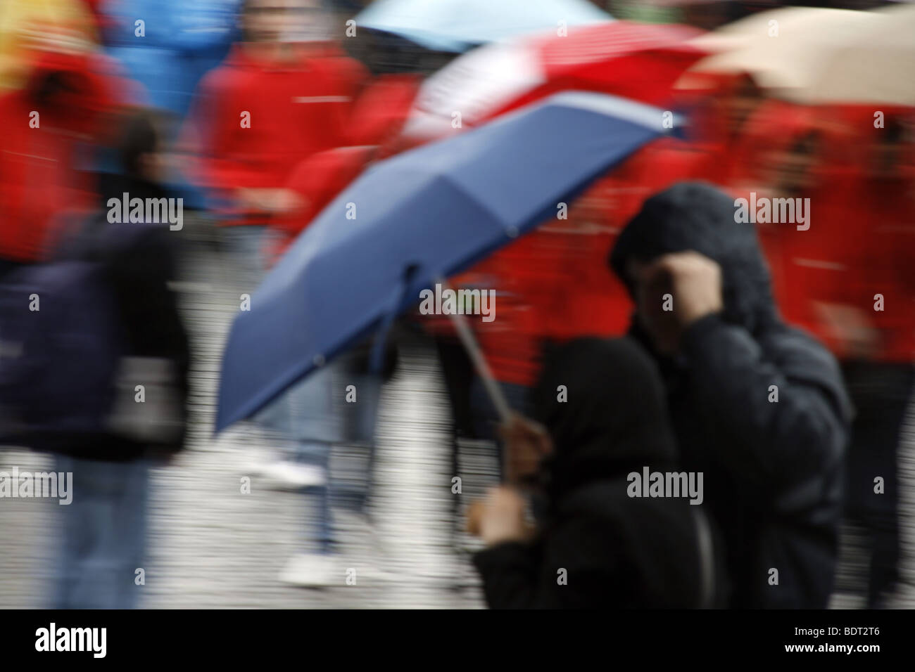 Queue line umbrella crowd people tourists bright hi-res stock ...