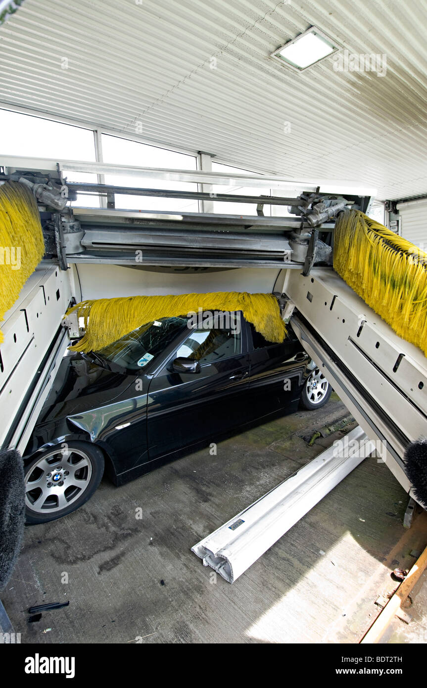a bmw 3 series crushed in a car wash accident after driver lost control ...