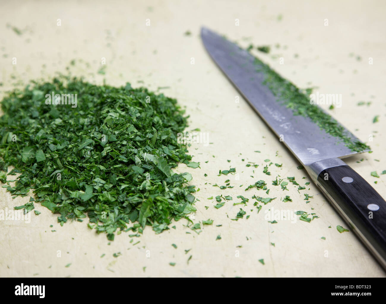 freshly prepared parsley cut with a professional chefs knife Stock ...