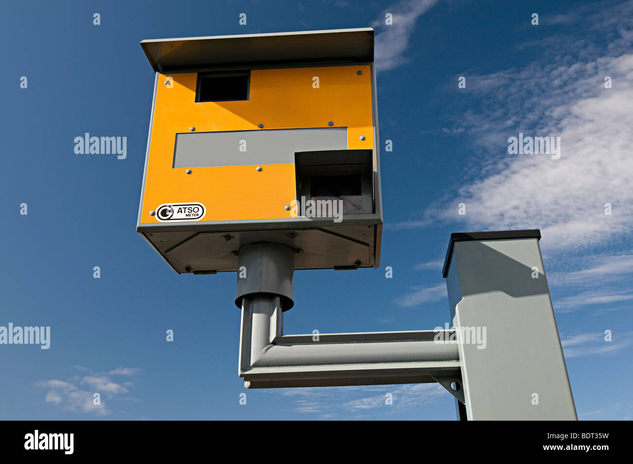 a British speed camera known as a gatso on the side of a road on a ...
