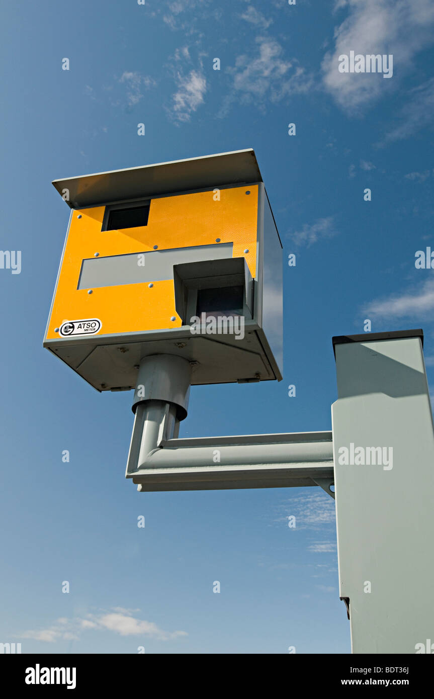a British speed camera known as a gatso on the side of a road on a ...
