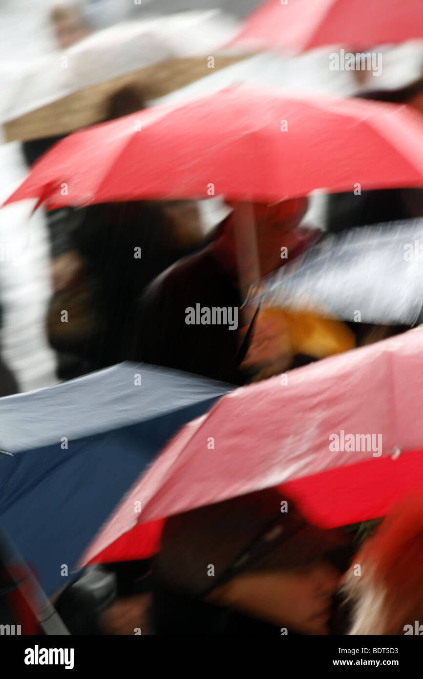 Queue line umbrella crowd people tourists bright hi-res stock ...