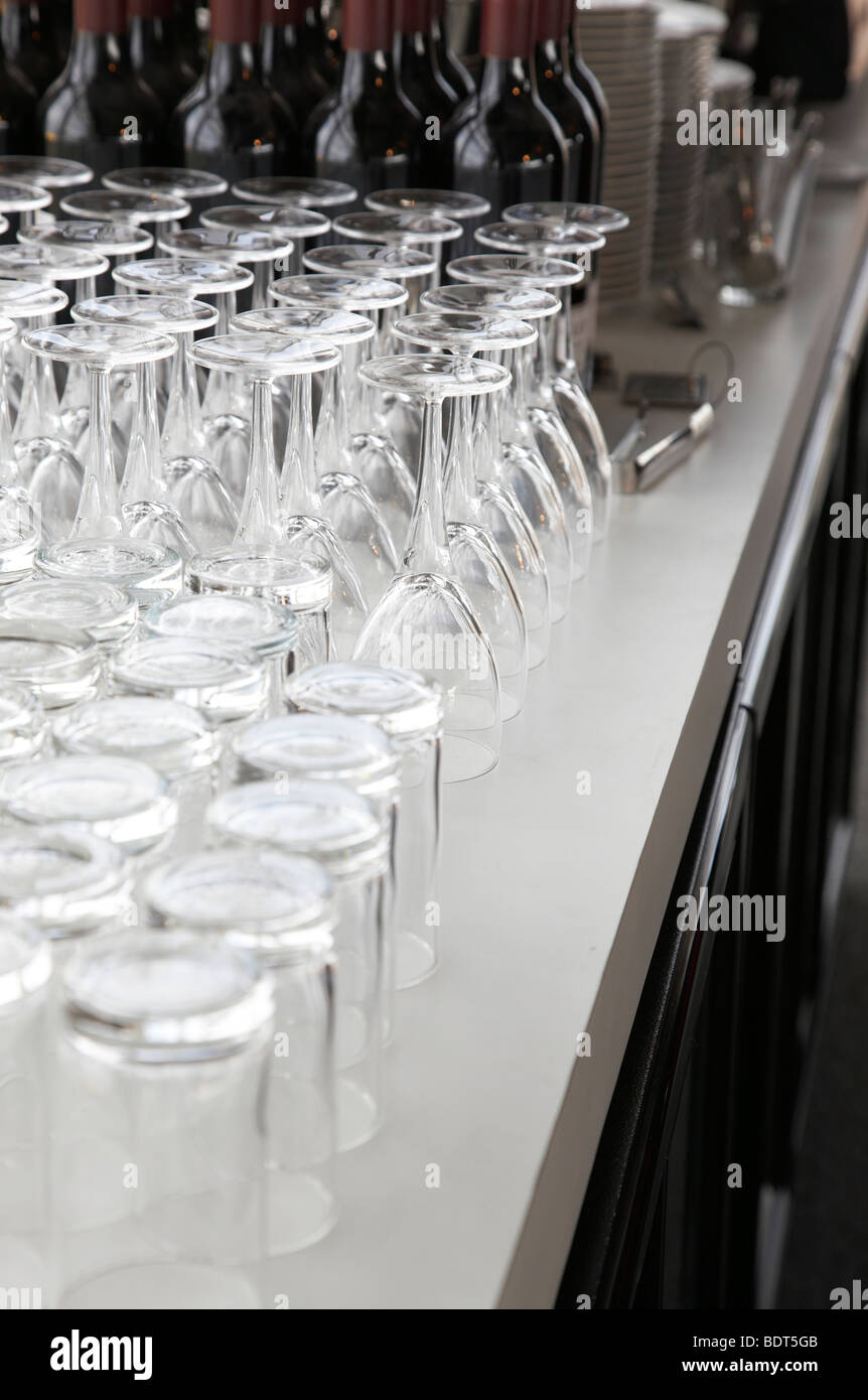 Wine bottles behind bar hi-res stock photography and images - Alamy