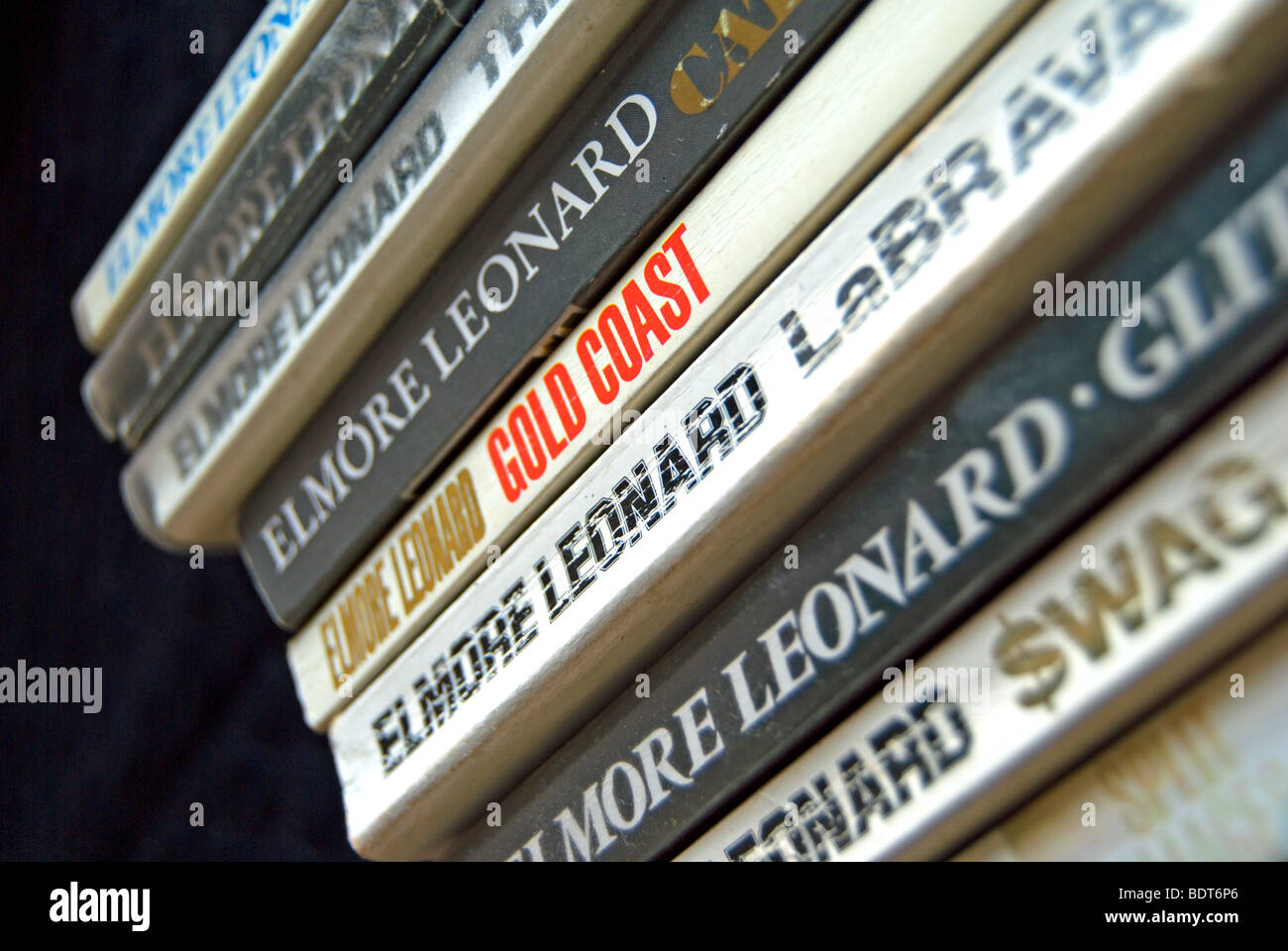 pile of well-thumbed books by american crime writer elmore leonard ...