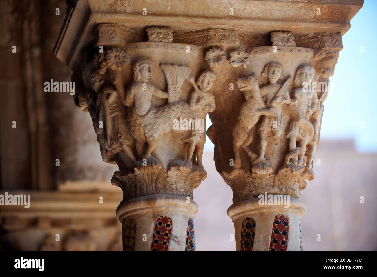 Decorated medieval historicated column capitals in the clositers of ...