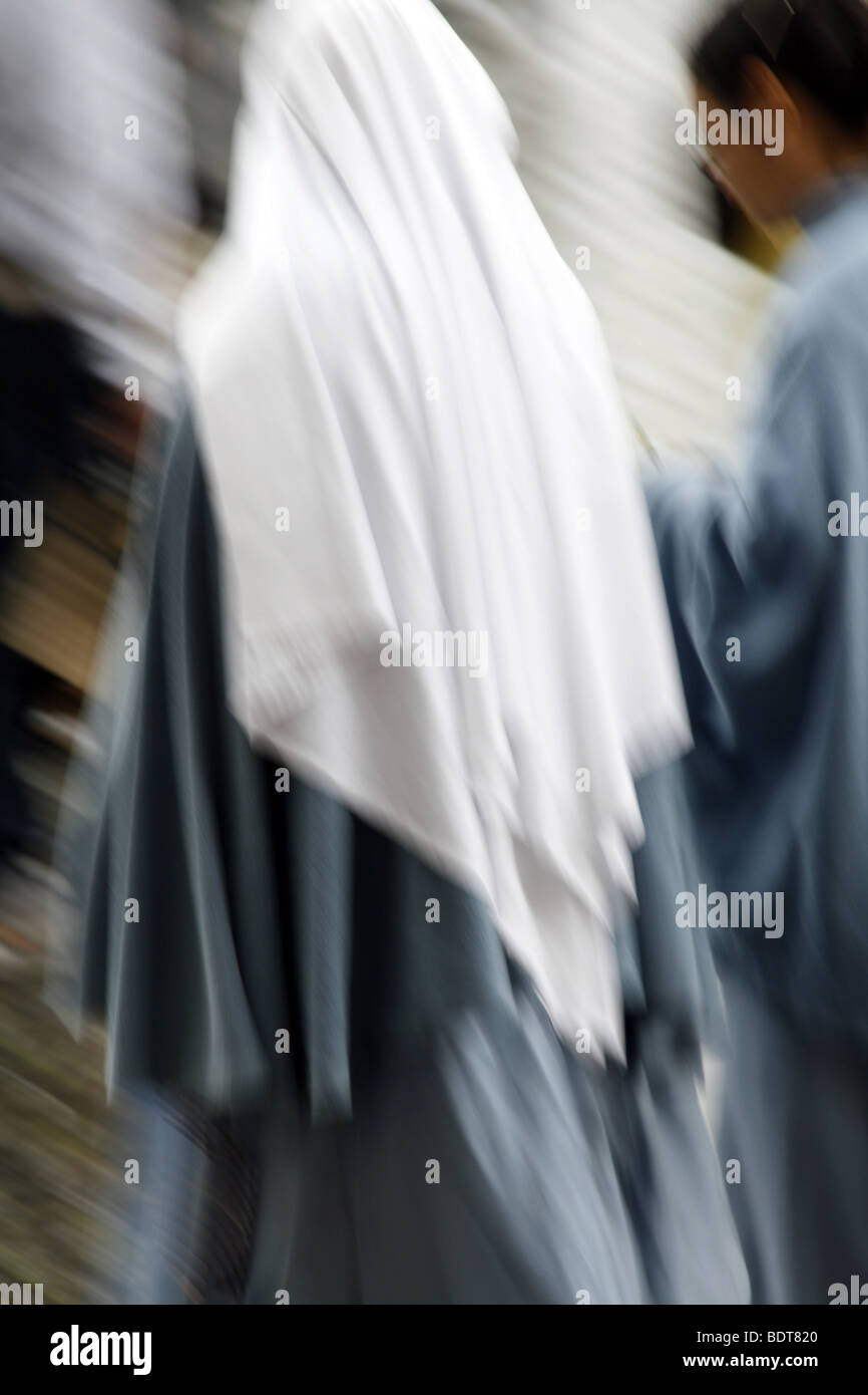 nun walking in street in the vatican, rome Stock Photo - Alamy