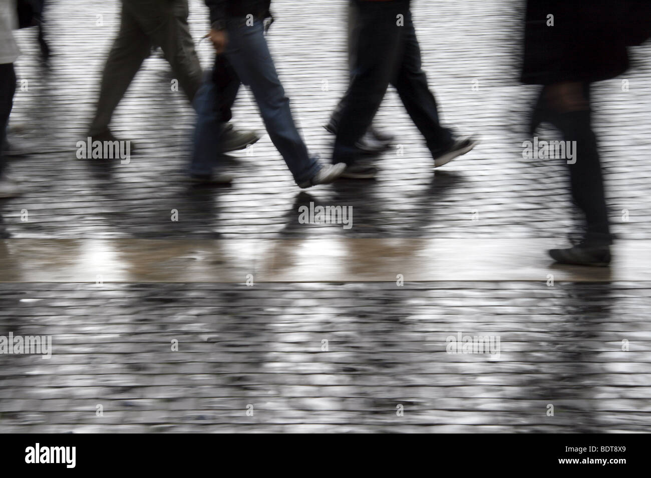 fast speed feet legs walking in street in town Stock Photo - Alamy