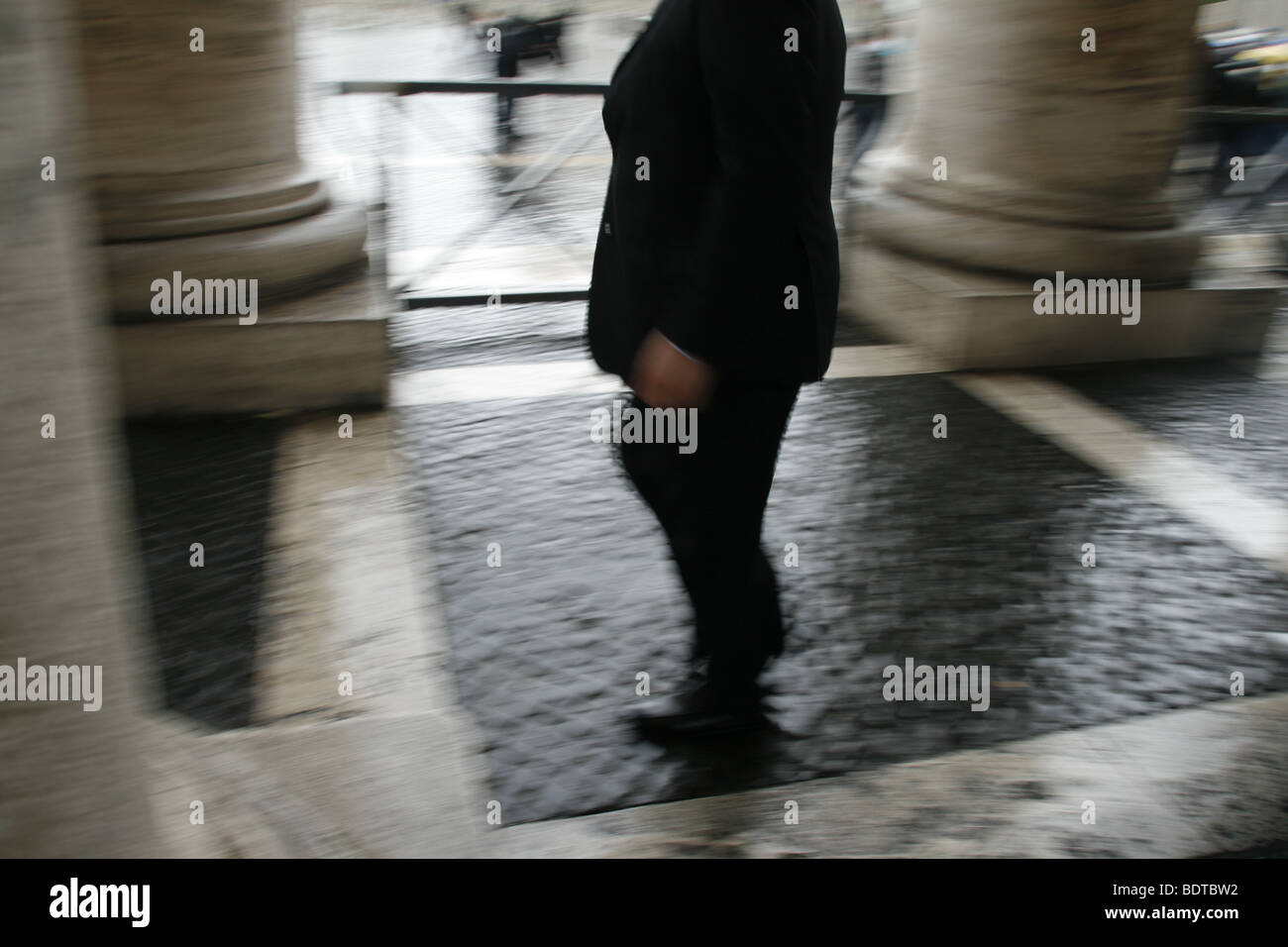 one person walking in street in city town Stock Photo - Alamy