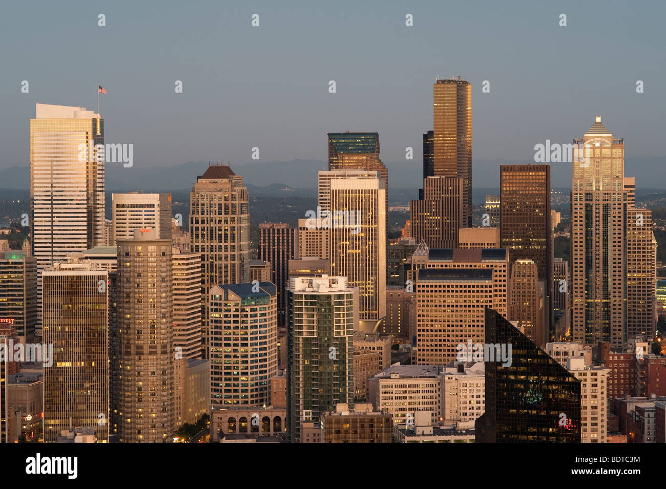 Retro image of Seattle Skyline and downtown building at sunset with ...